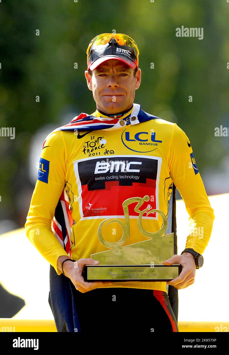 BMC Racing Team's Cadel Evans celebrates after winning the Tour de ...