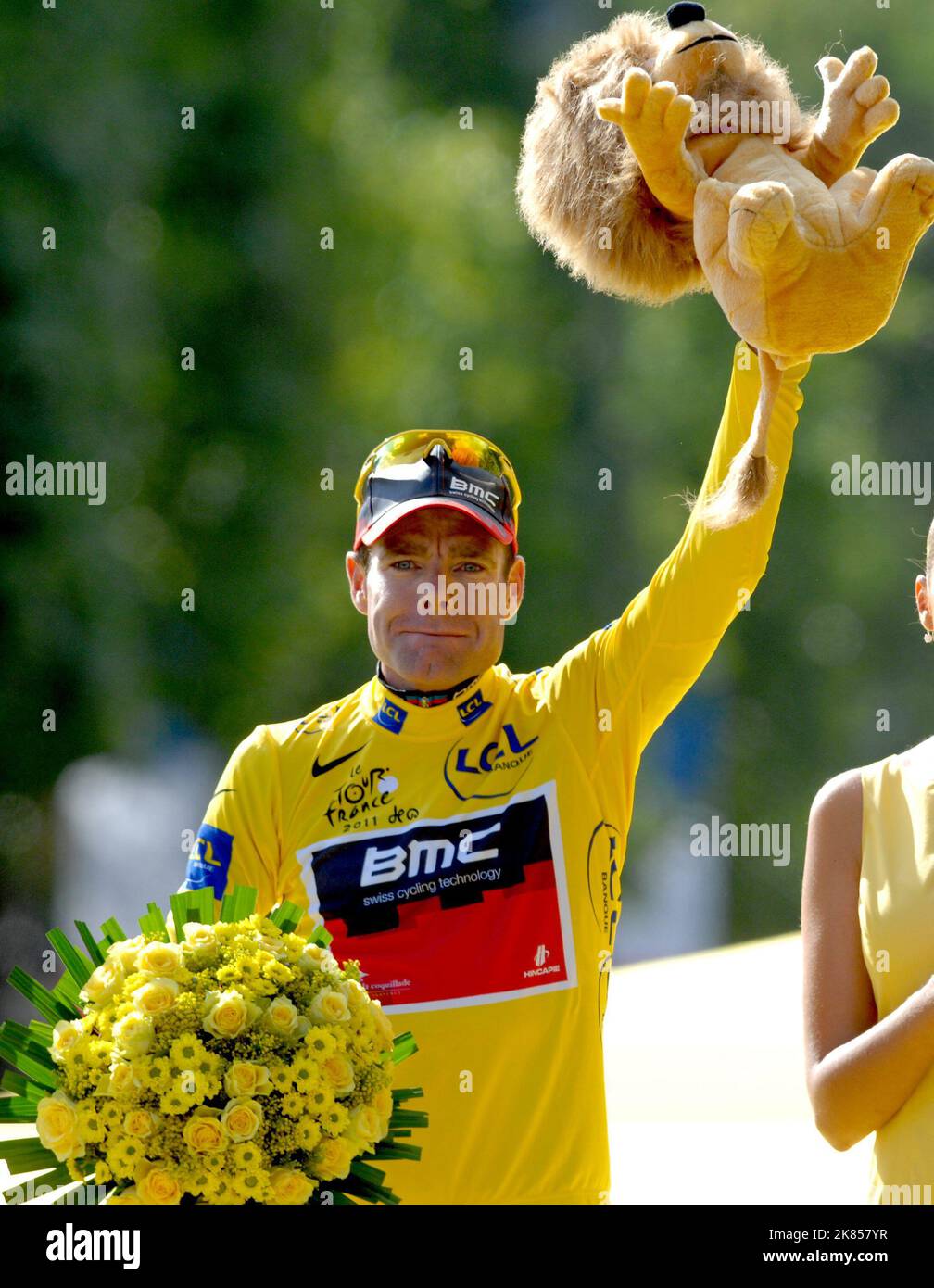 BMC Racing Team's Cadel Evans celebrates after winning the Tour de ...