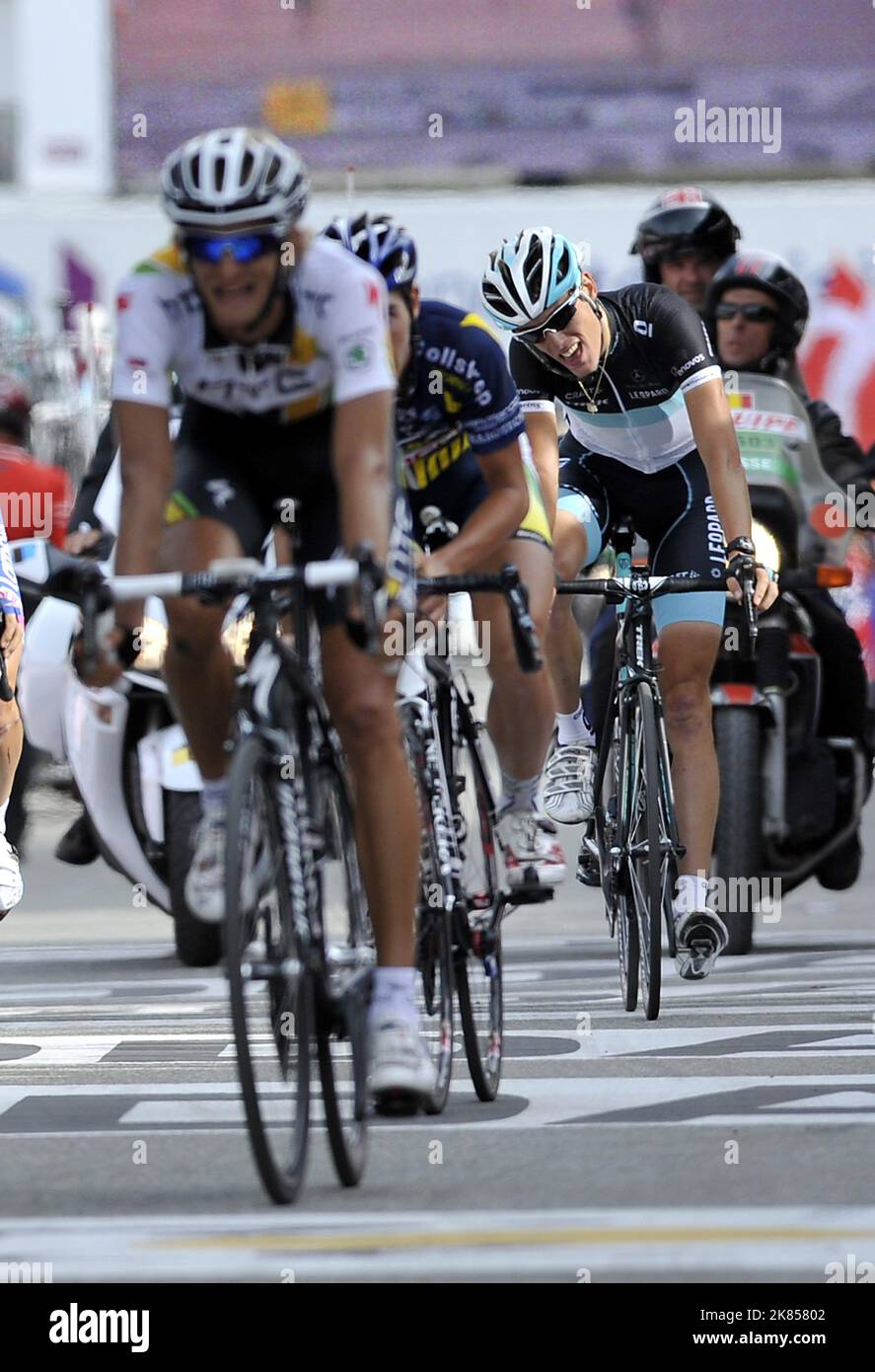 Team Leopard-Trek's Andy Schleck (R) rides over the line in 9th ...