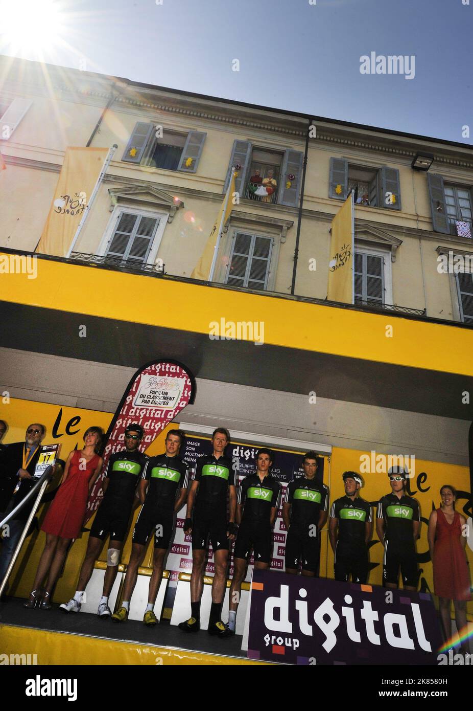 Team Sky's stand on the podium at the start of the race to collect ...