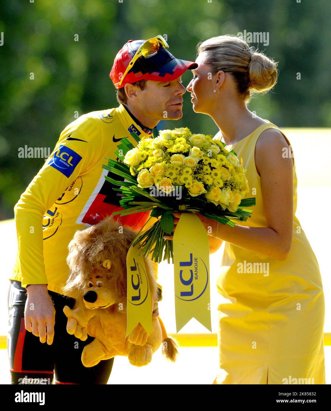 BMC Racing Team's Cadel Evans celebrates after winning the Tour de ...
