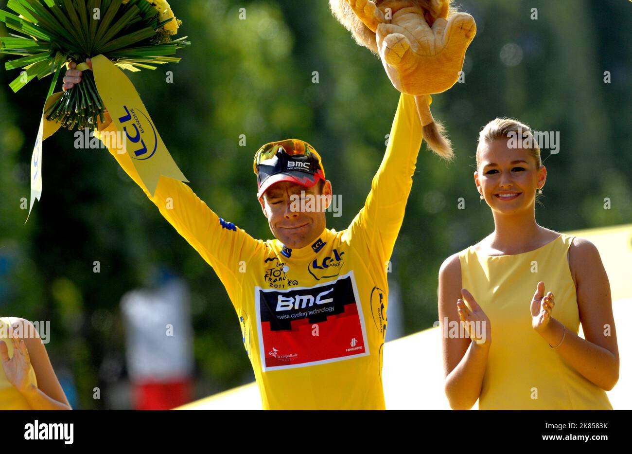 BMC Racing Team's Cadel Evans celebrates after winning the Tour de ...
