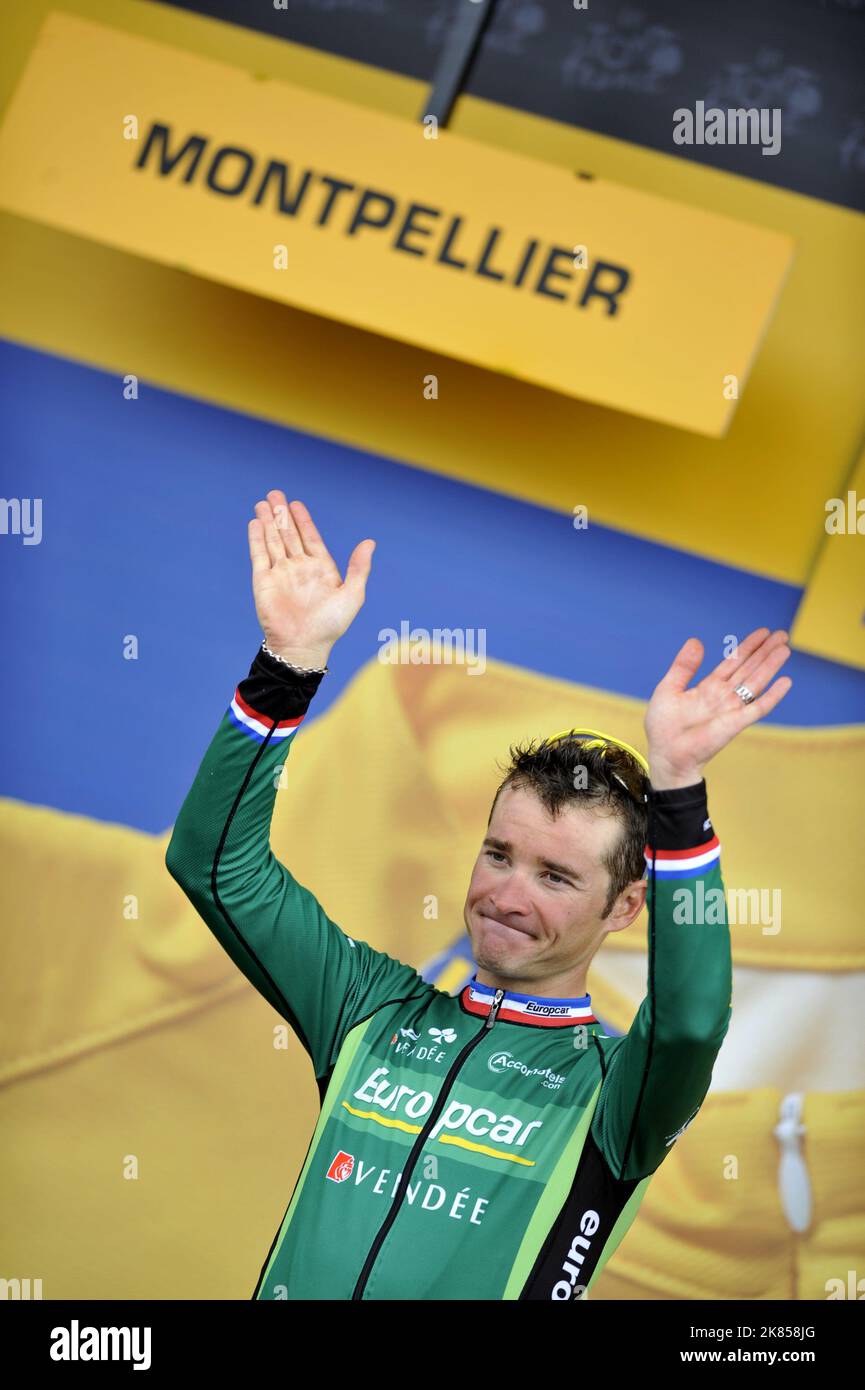 Team Europcar's Thomas Voeckler retains the yellow leader's jersey ...