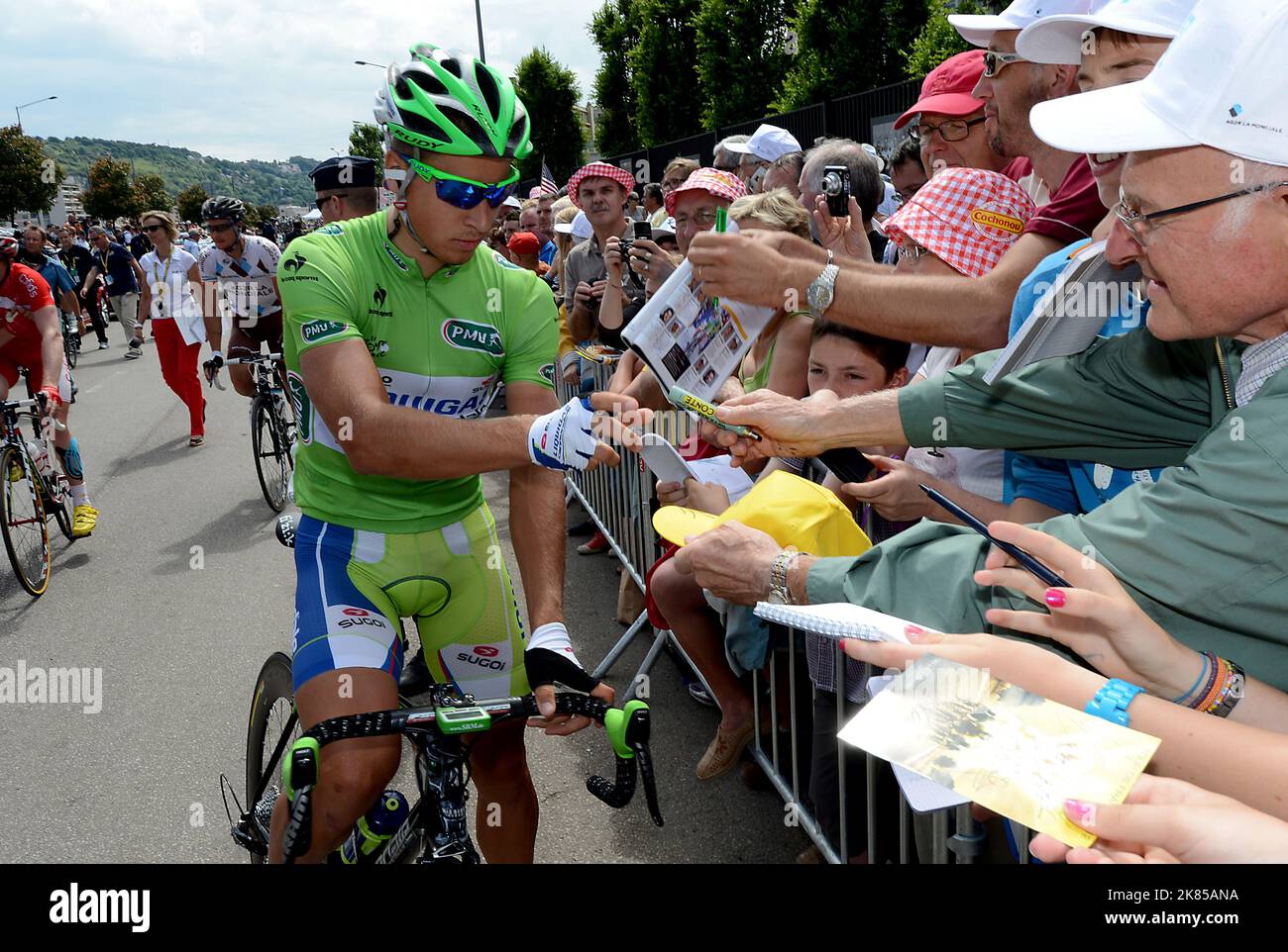 Peter Sagan of team Liquigas - Cannondale signs autographs at the start ...