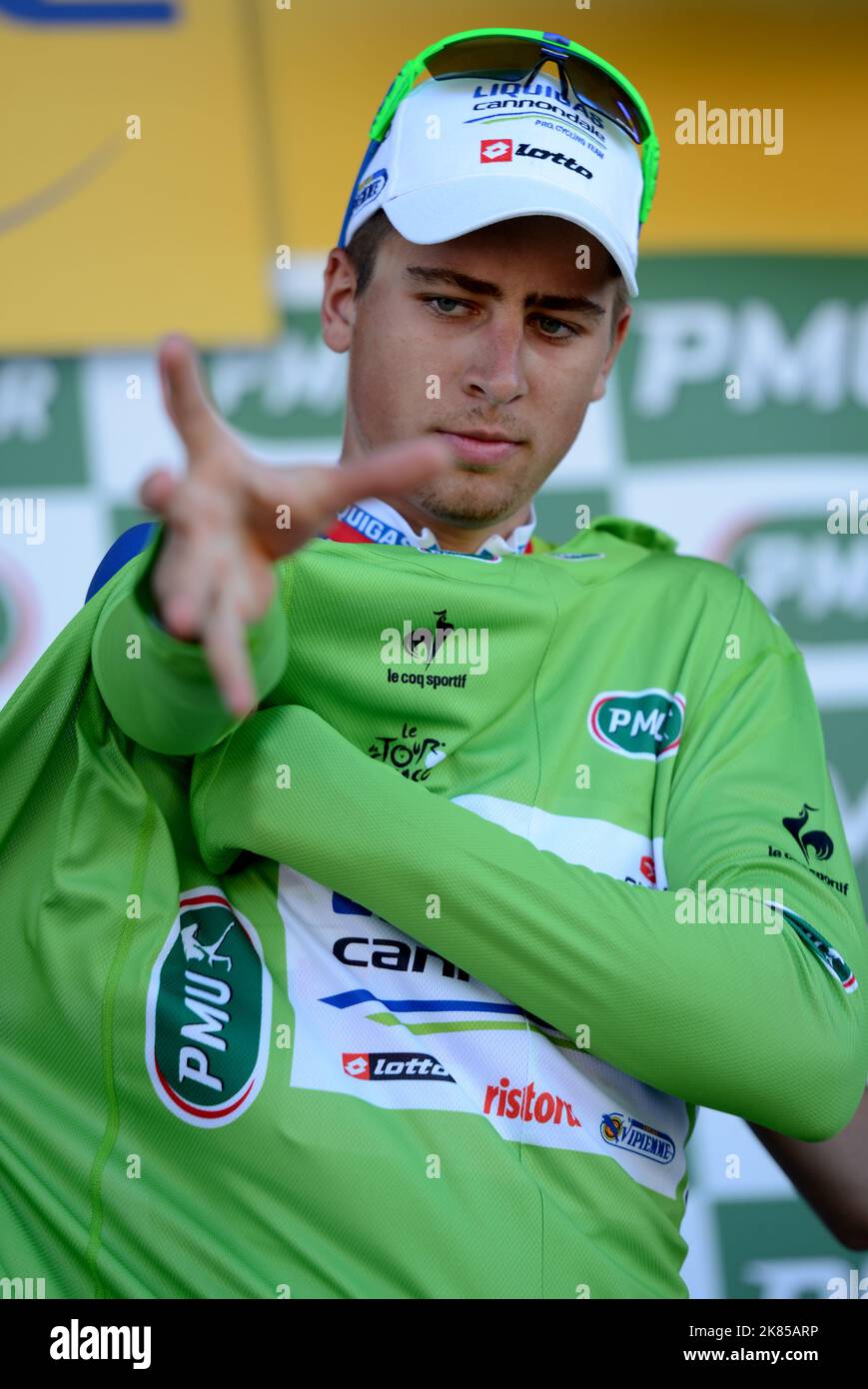 Peter Sagan enters the podium to collect his trophy and retains the ...