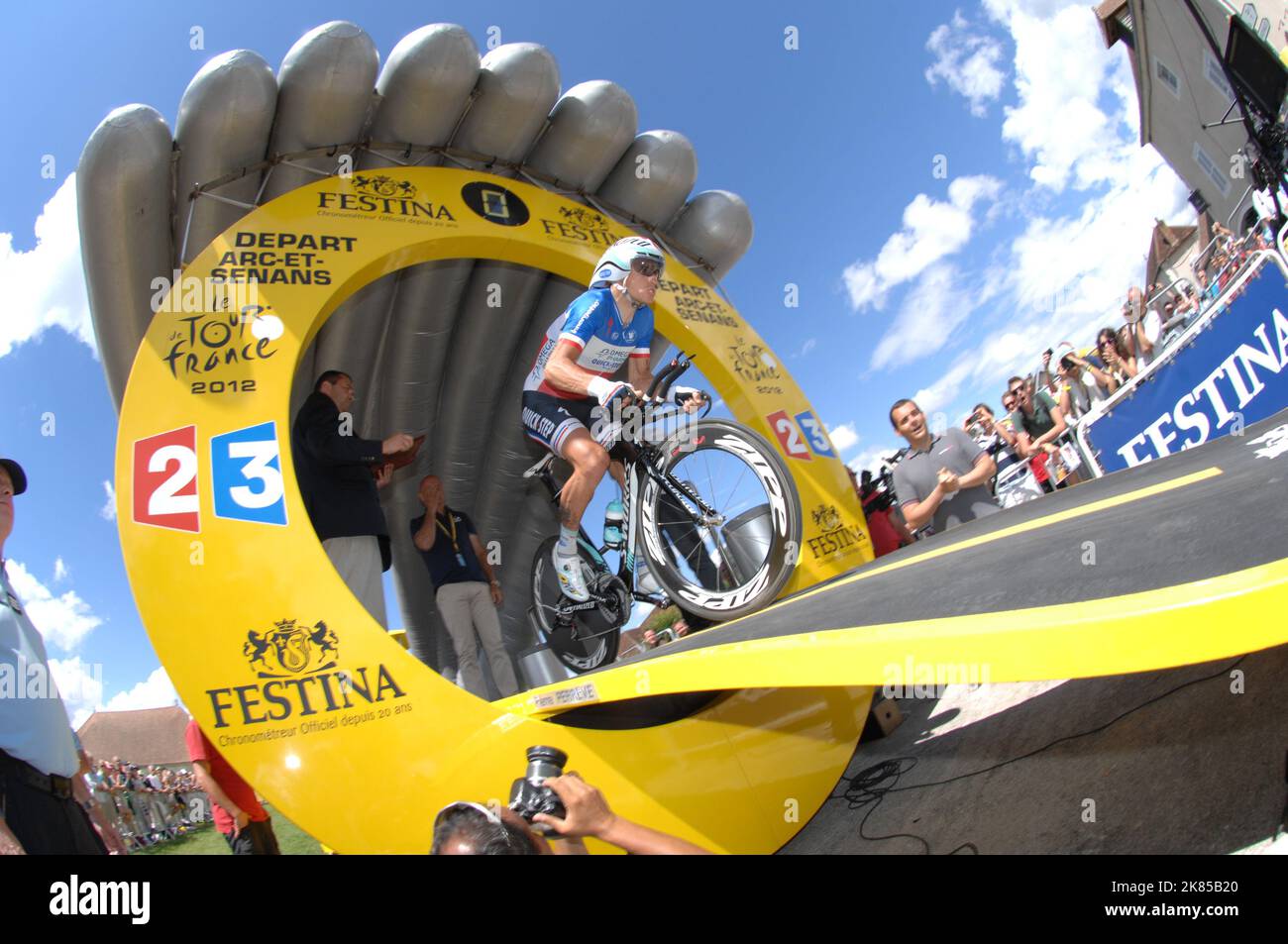Sylvain Chavanel team Omega Pharma Quickstep rolls off the starting ...
