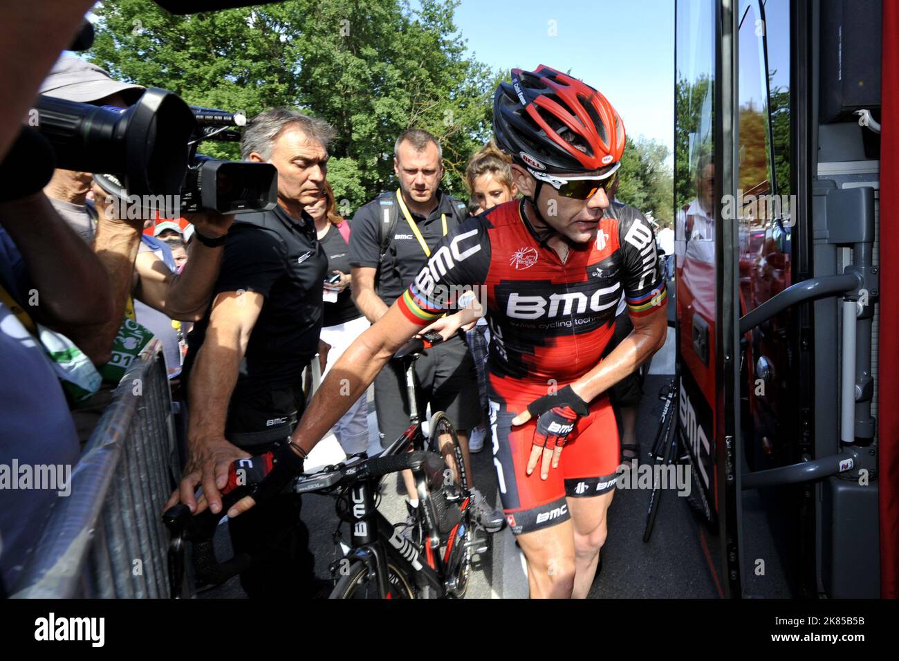 Cadel Evans of team BMC walks to his team bus after crossing the finish ...