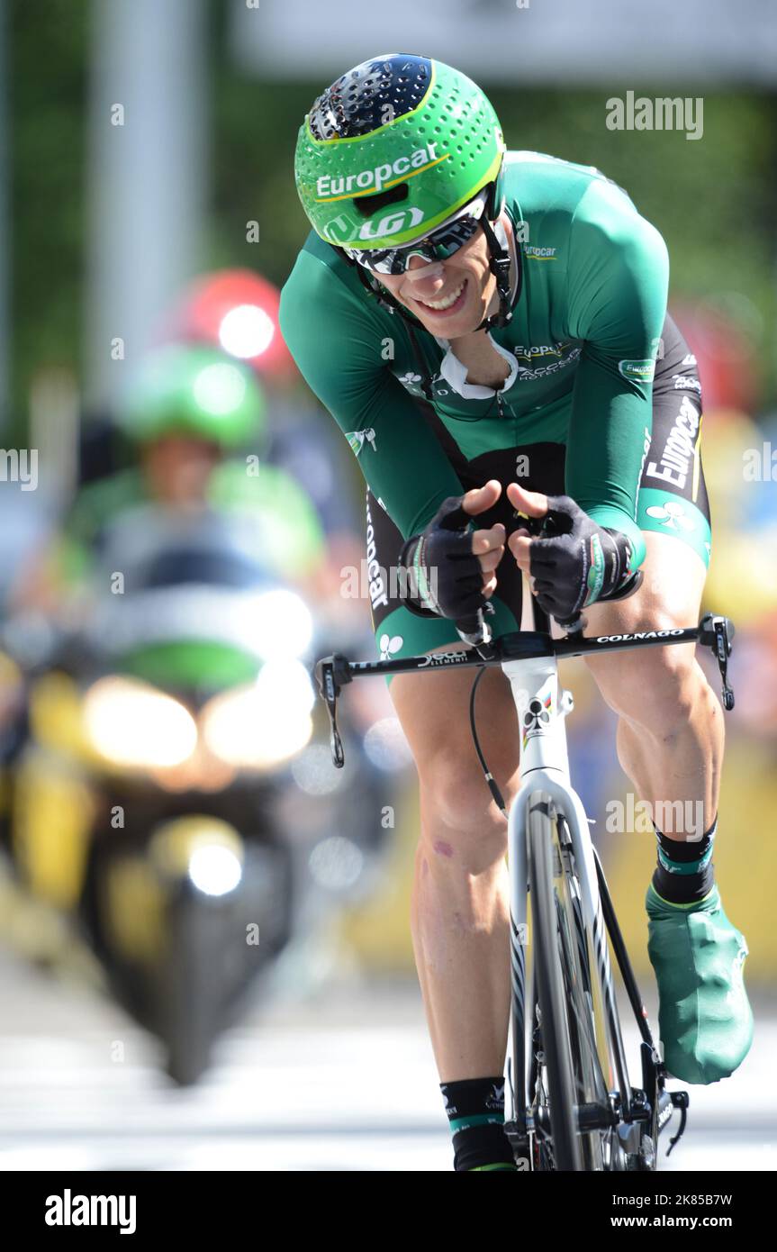 Pierre Rolland team Europecar crosses the finish line, Stage 9 Arc-Et ...
