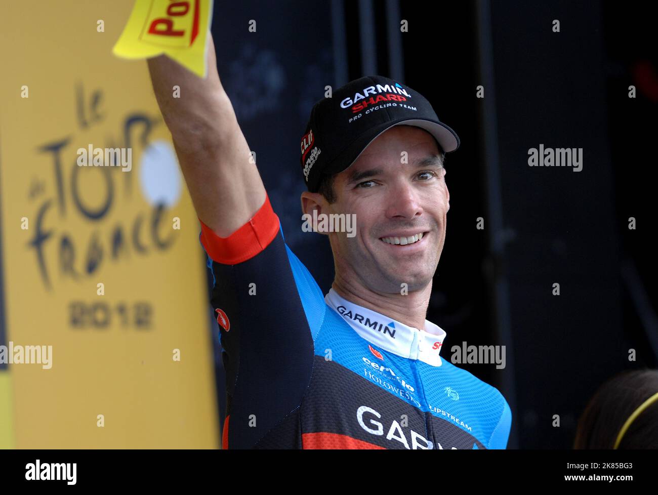 David Millar reacts on the podium after he wins the stage Stock Photo ...