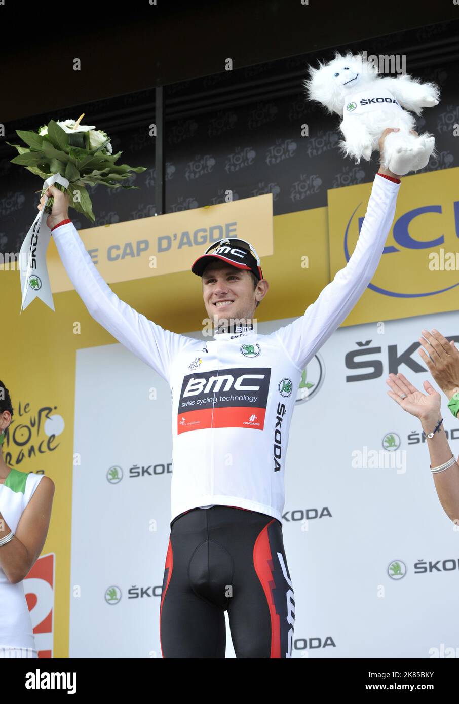 Tejay Van Garderen collects his young leader's jersey on the podium ...