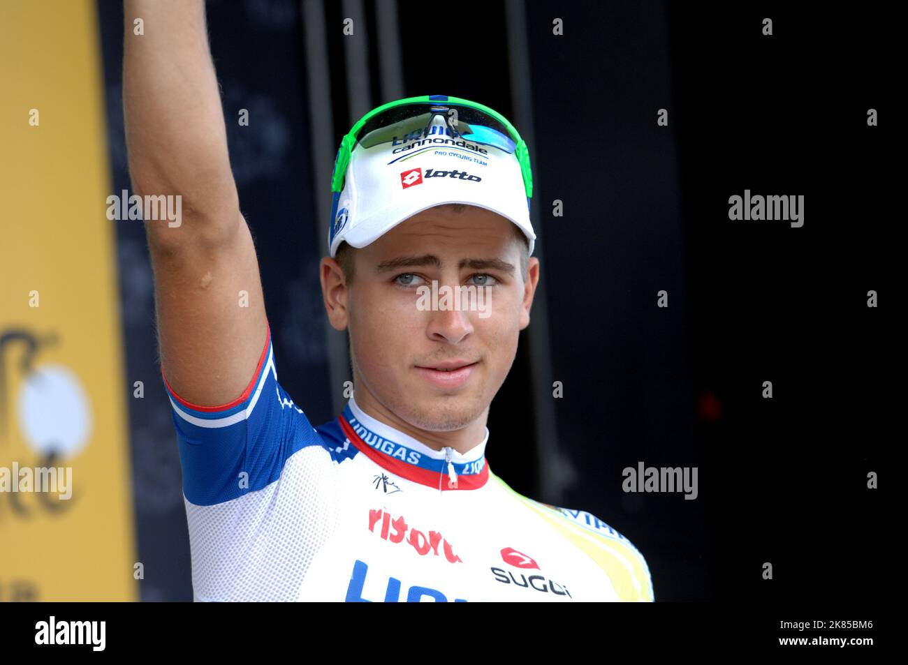 Peter Sagan team Liquigas stands on the podium to collect his trophy ...