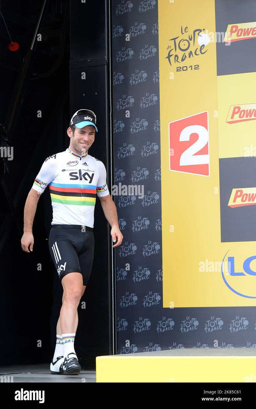 Mark Cavendish makes his way to the podium after winning his second ...