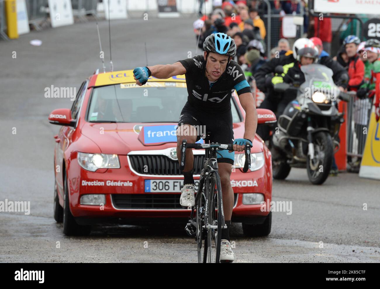 Richie Porte of Team Sky Procycling crosses the finish line to win ...