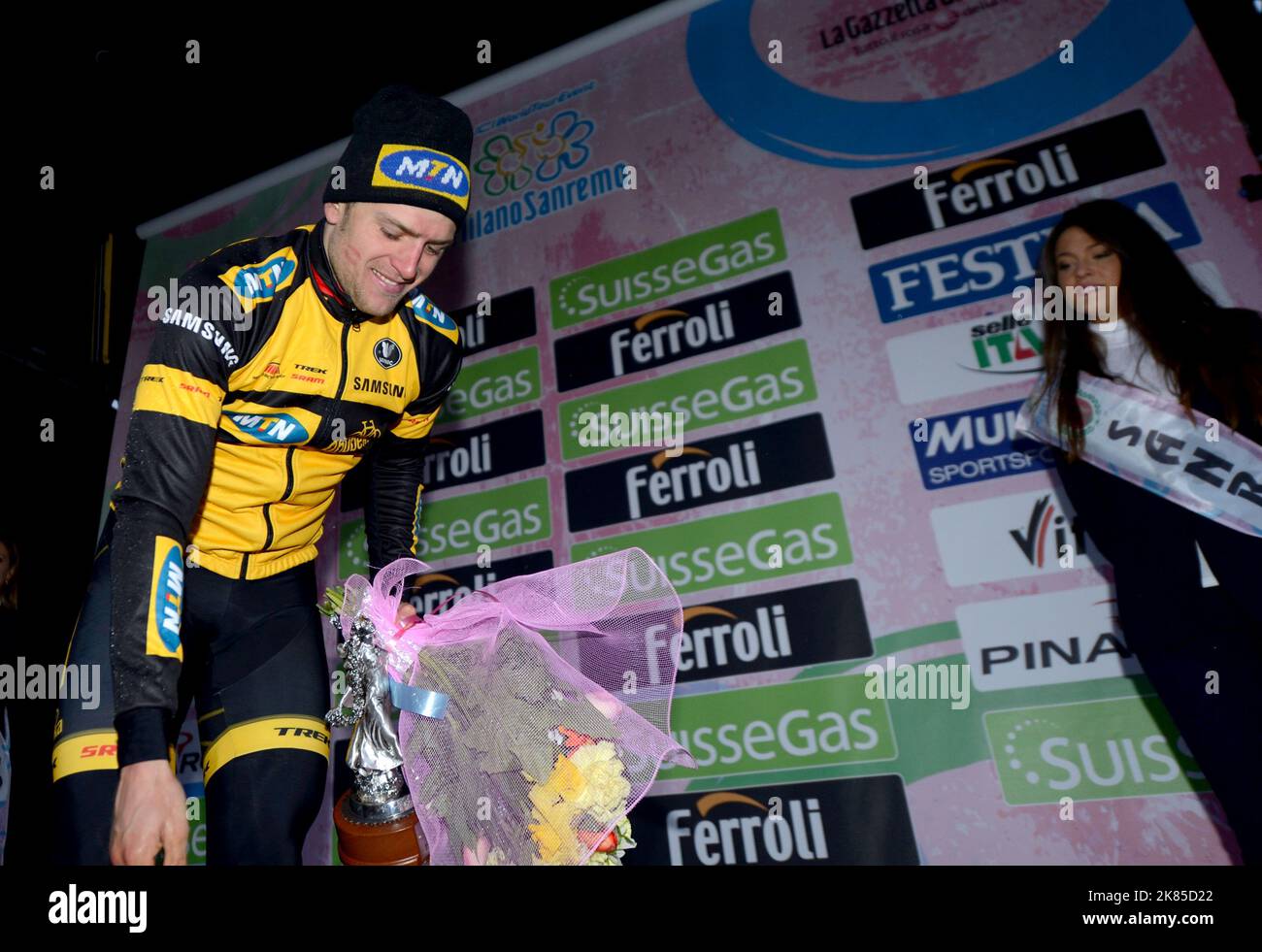Gerald Ciolek (centre) of team MTN - Qhubeka, celebrates with champagne ...