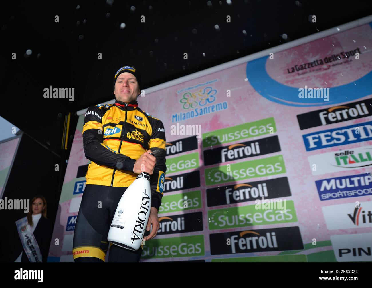 Gerald Ciolek (centre) of team MTN - Qhubeka, celebrates with champagne ...