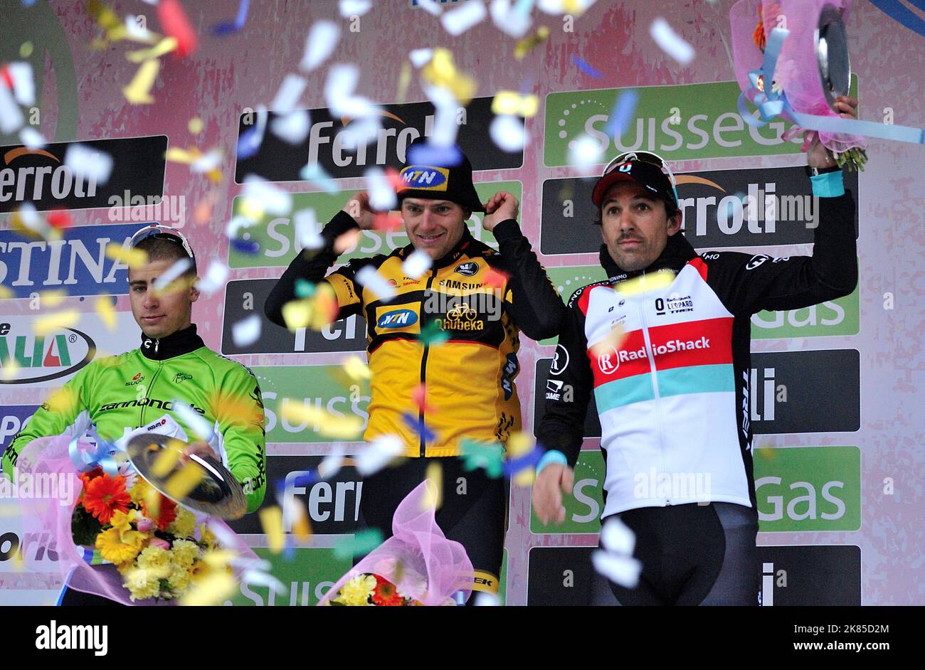 Gerald Ciolek of team MTN - Qhubeka (centre) celebrates with champagne ...