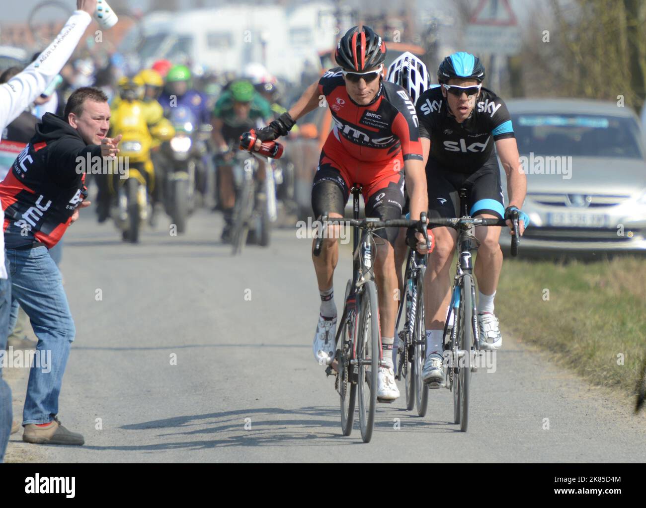 Taylor Phinney team Radioshack racing team takes a water bottle from ...