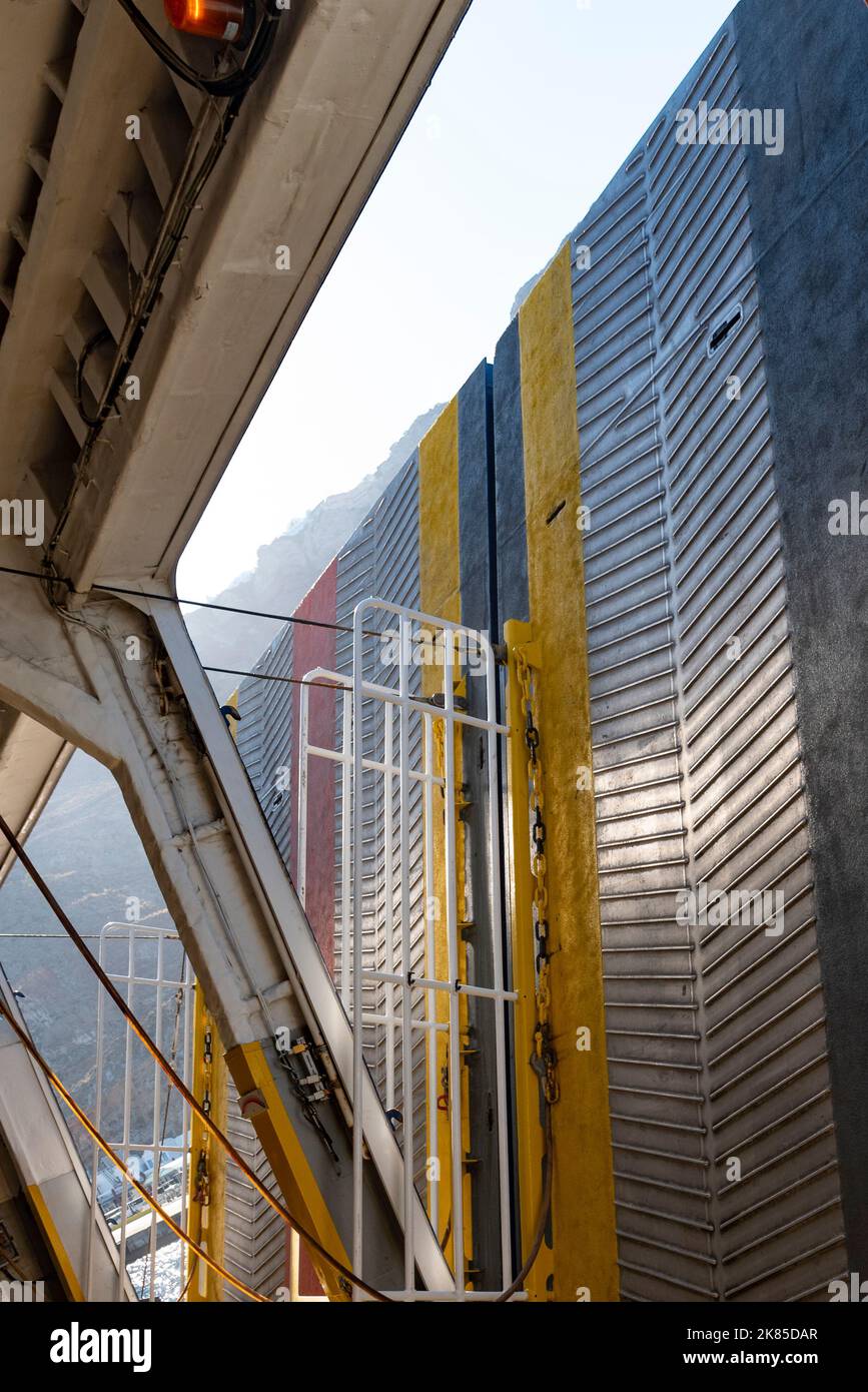 Santorini, Greece. 2022. Heavy metal double loading ramps opening on a ...