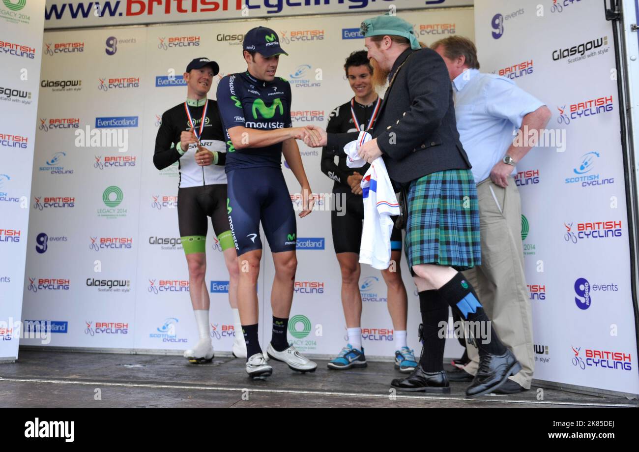 Alex Dowsett Team Movistar collects his Gold medal on the podium Stock ...