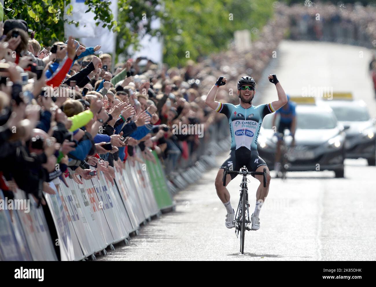Mark Cavendish, team Omega Pharma Quickstep, crosses the finish line to ...