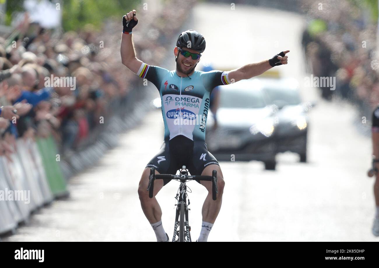 Mark Cavendish, team Omega Pharma Quickstep, crosses the finish line to ...