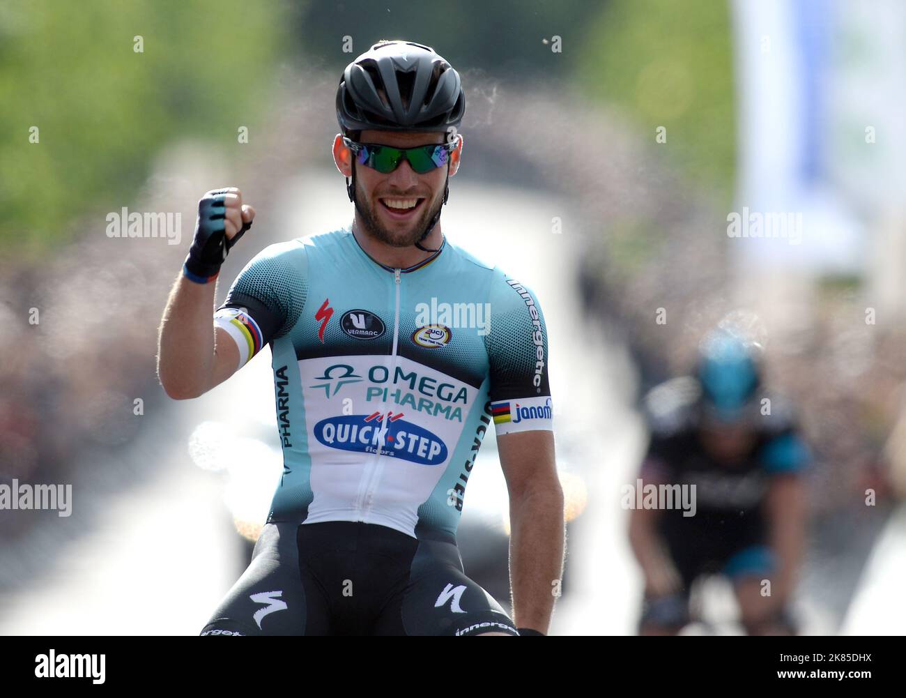 Mark Cavendish, team Omega Pharma Quickstep, crosses the finish line to ...