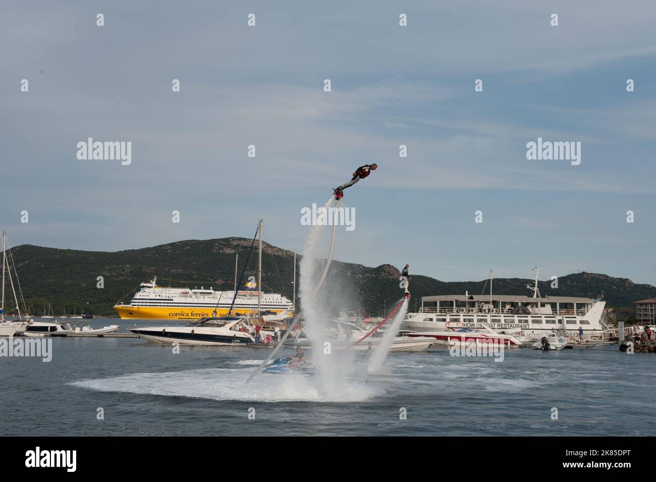 Omega Pharma Quickstep's Mark Cavendish arrives by motorboat with a ...