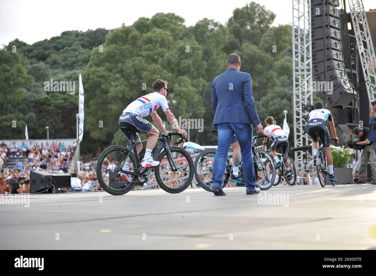Omega Pharma Quickstep's Mark Cavendish rides off stage during the ...