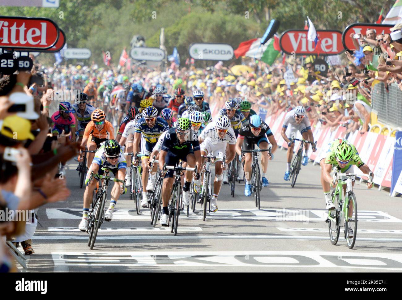 Simon Gerrans of team Orica Greenedge wins the stage in a photo finish ...