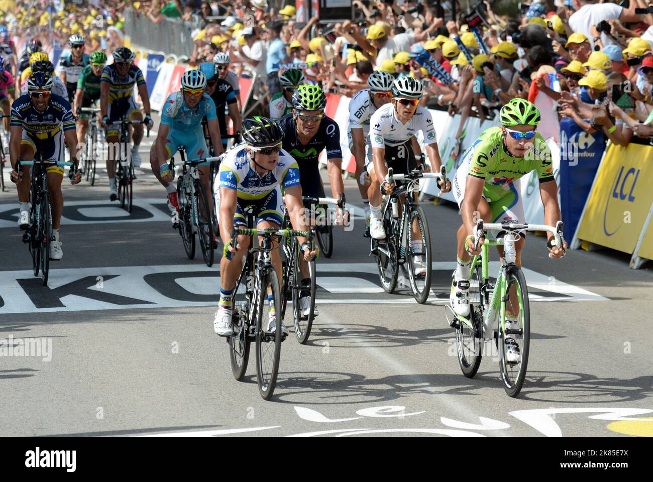 Simon Gerrans of team Orica Greenedge wins the stage in a photo finish ...