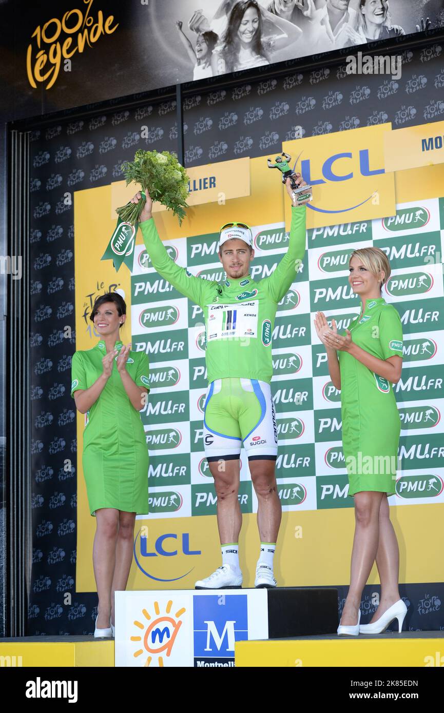 Peter Sagan team Liquigas Cannondale takes the green points leader's jersey on the podium in ...