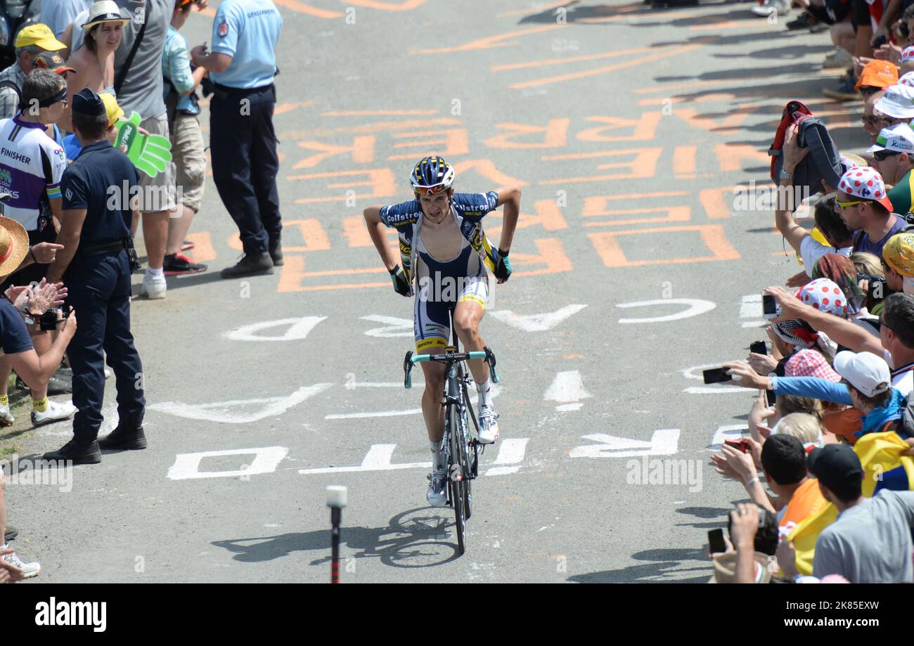 Wouter Poels of team Vacansoleil takes seventh place in the stage as he rides over the final ...