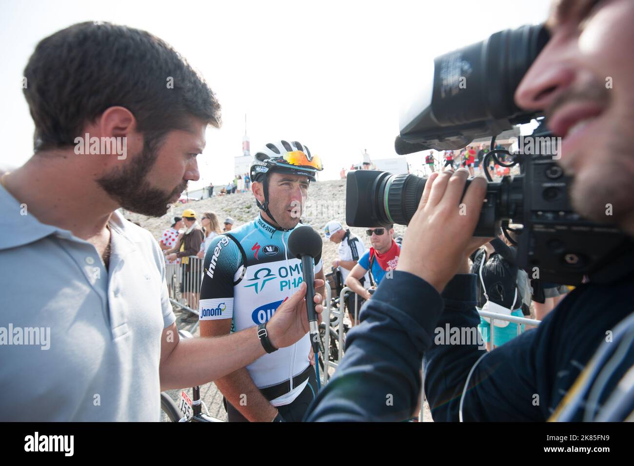 Jerome Pineau answers questions on the finish line Stock Photo - Alamy