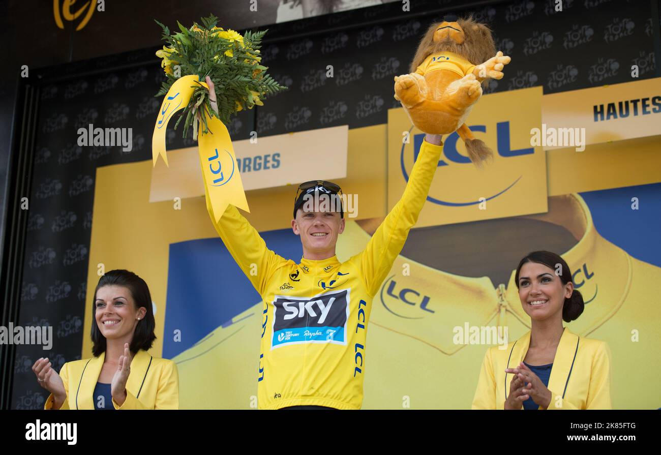 Chris Froome of Team Sky Procycling standing on the podium collecting ...