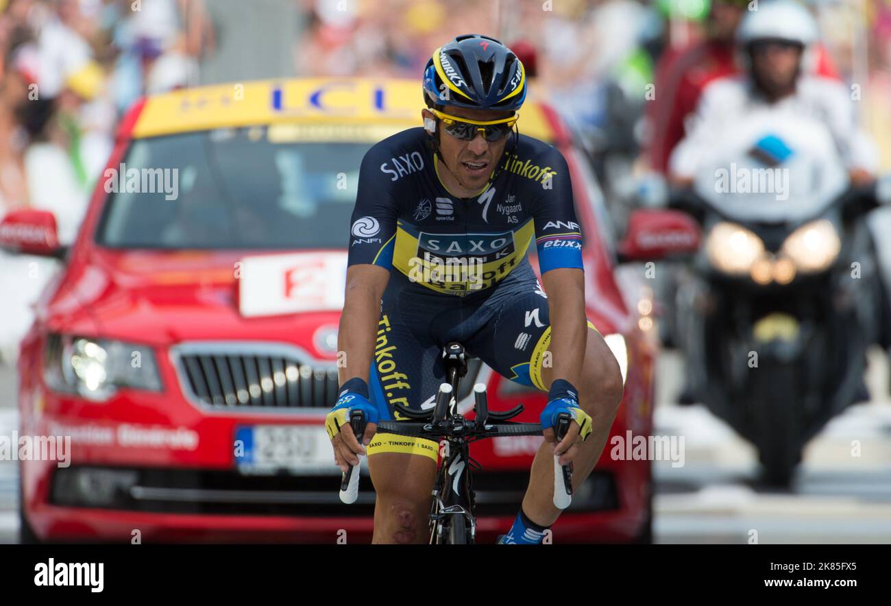 Alberto Contador team Saxo Tinkoff crosses the finish line to come 2nd ...