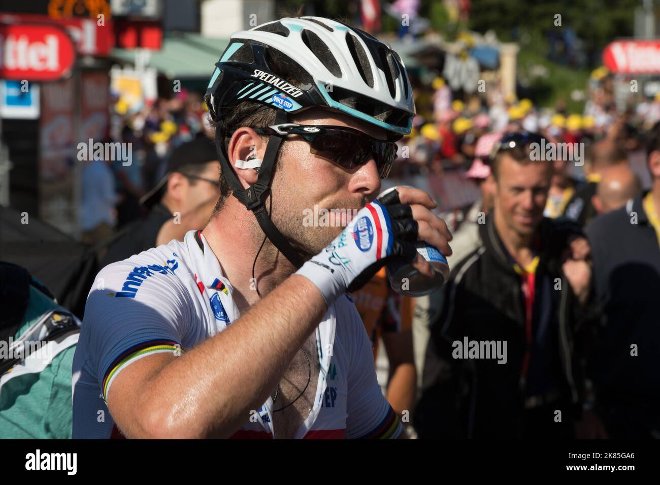 Mark Cavendish team Omega Pharma Quickstep takes a drink on the finish ...