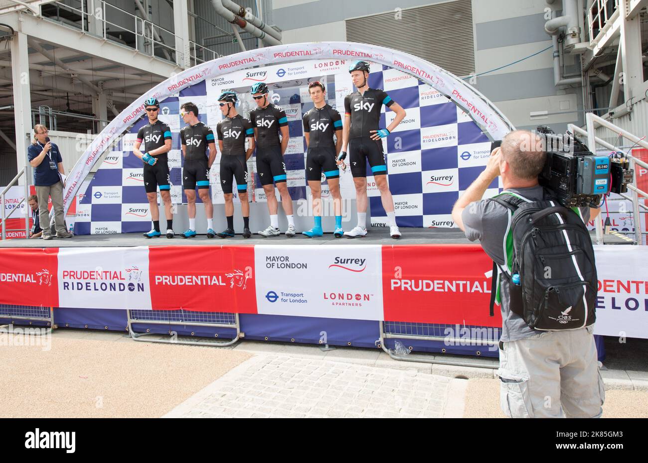 A cameraman films Gabriel Rasch, Christopher Sutton, Joshua Edmondson ...