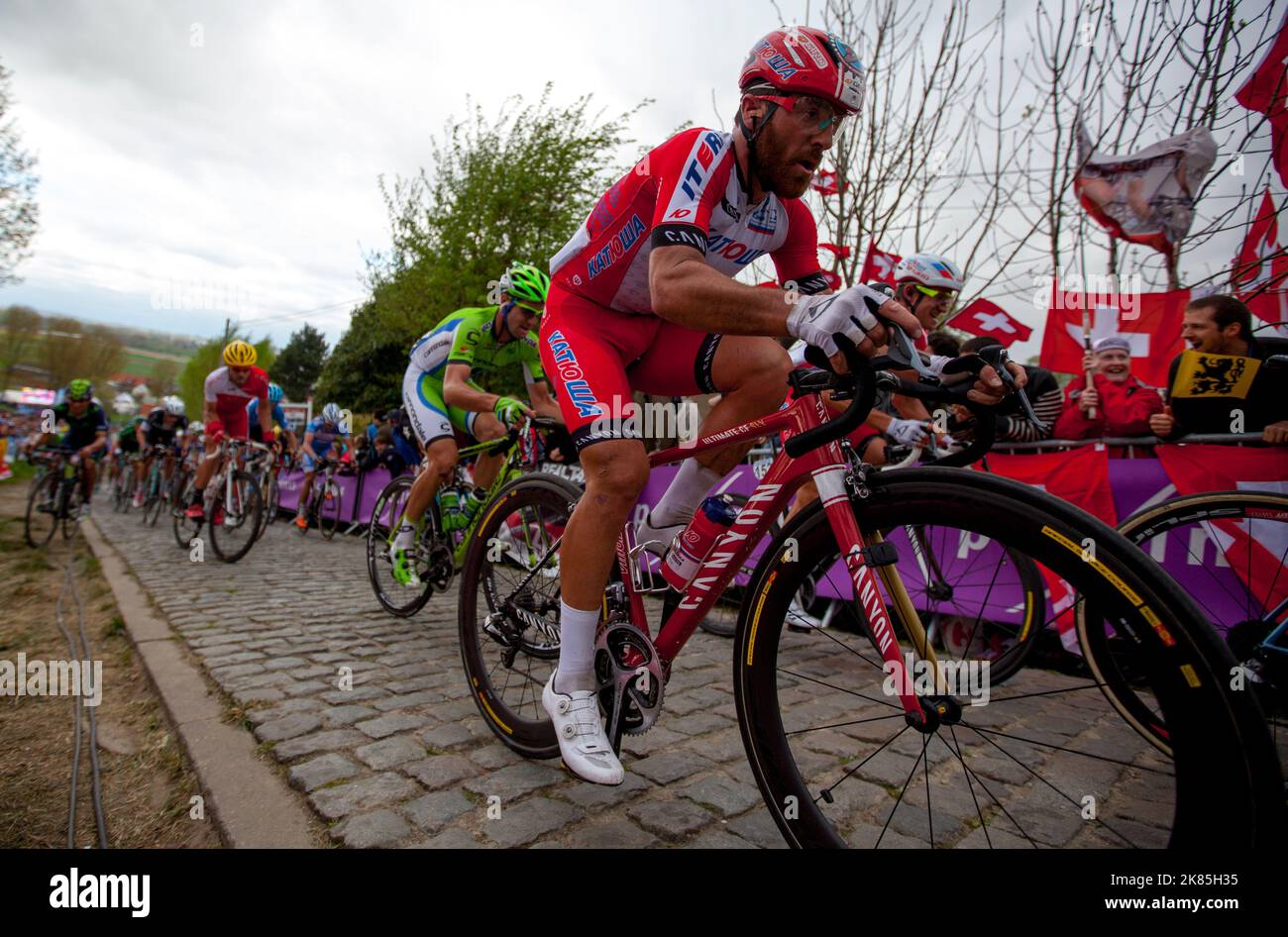 Luca Paolini shows of the custom paint job on his Katusha Helmet on the ...