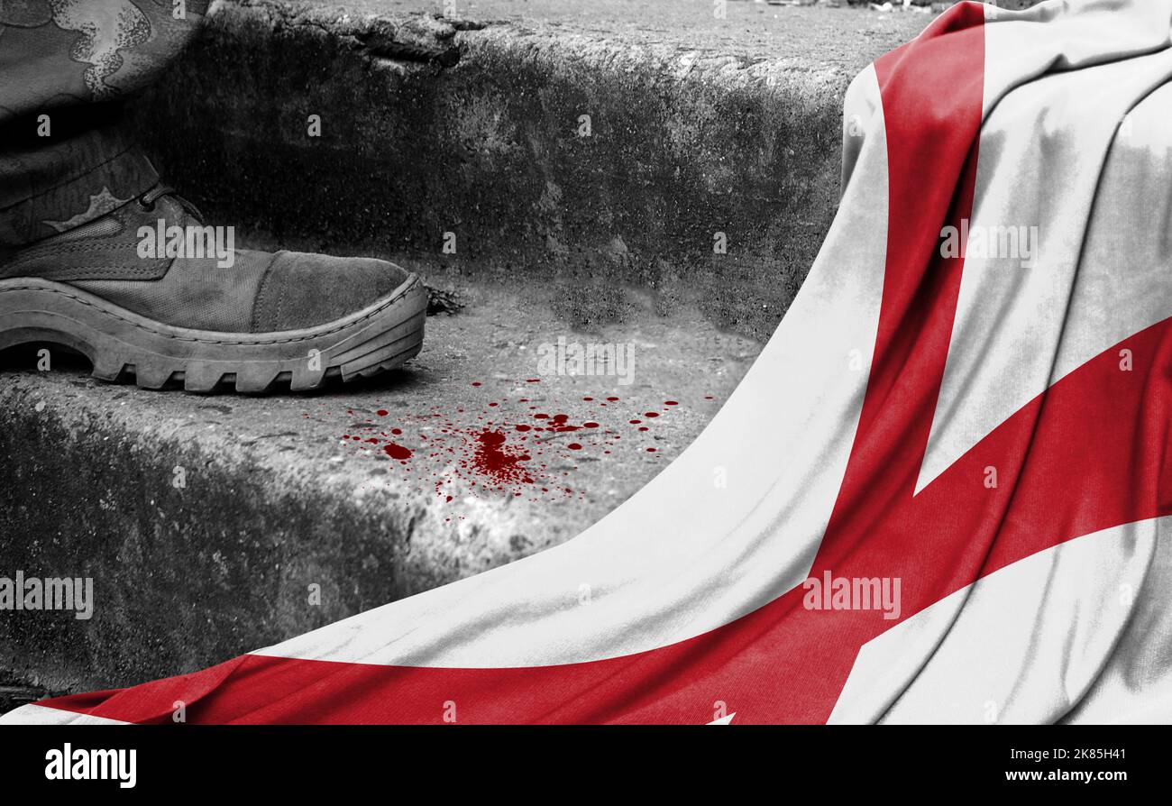 The leg of the military stands on the step next to the flag of State of ...
