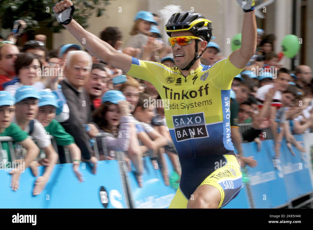 Alberto Contador crosses the line in 1st place after stage 1 of the ...