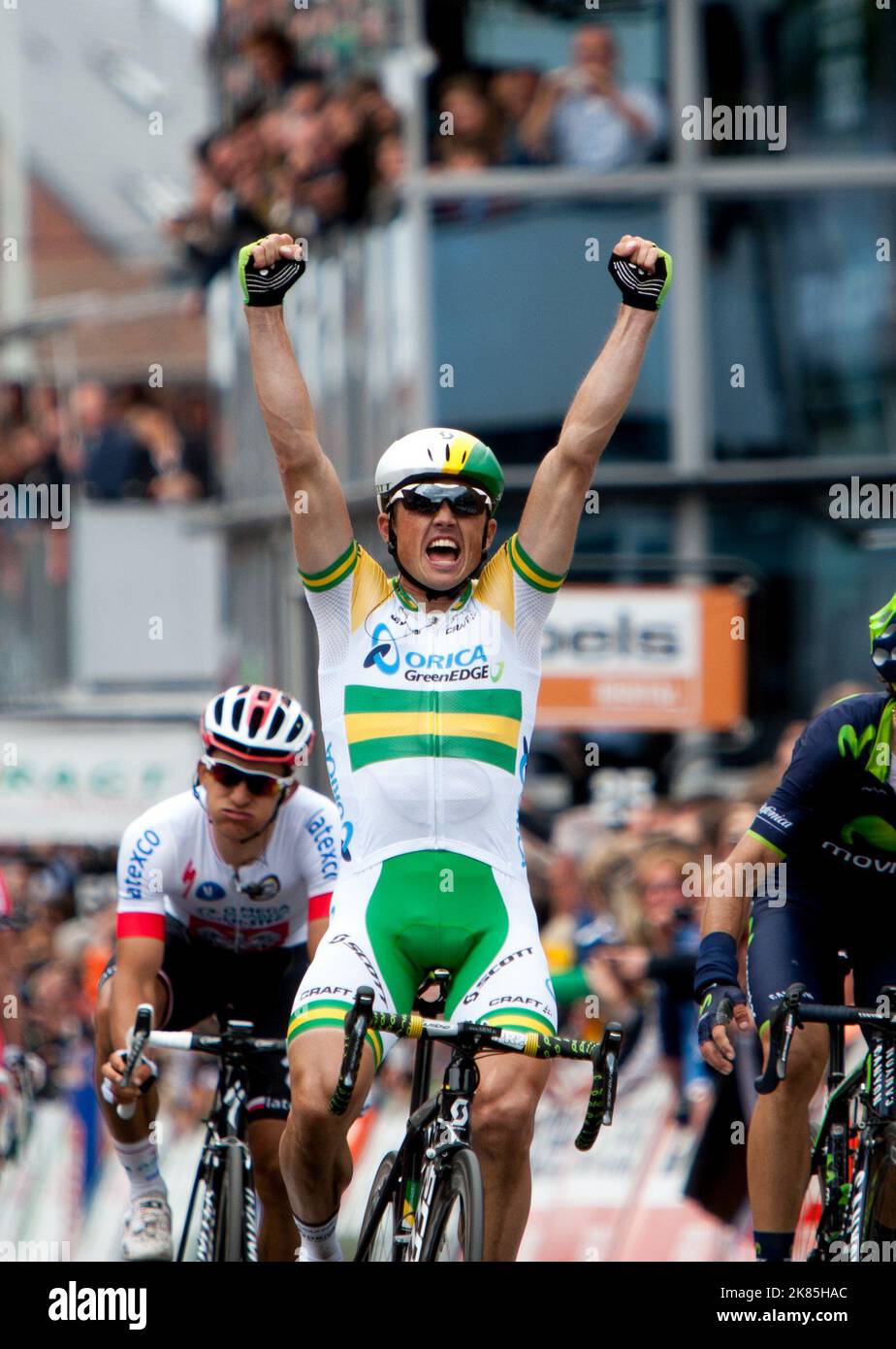 Australian Road Race Champion Simon Gerrans celebrates winning the ...