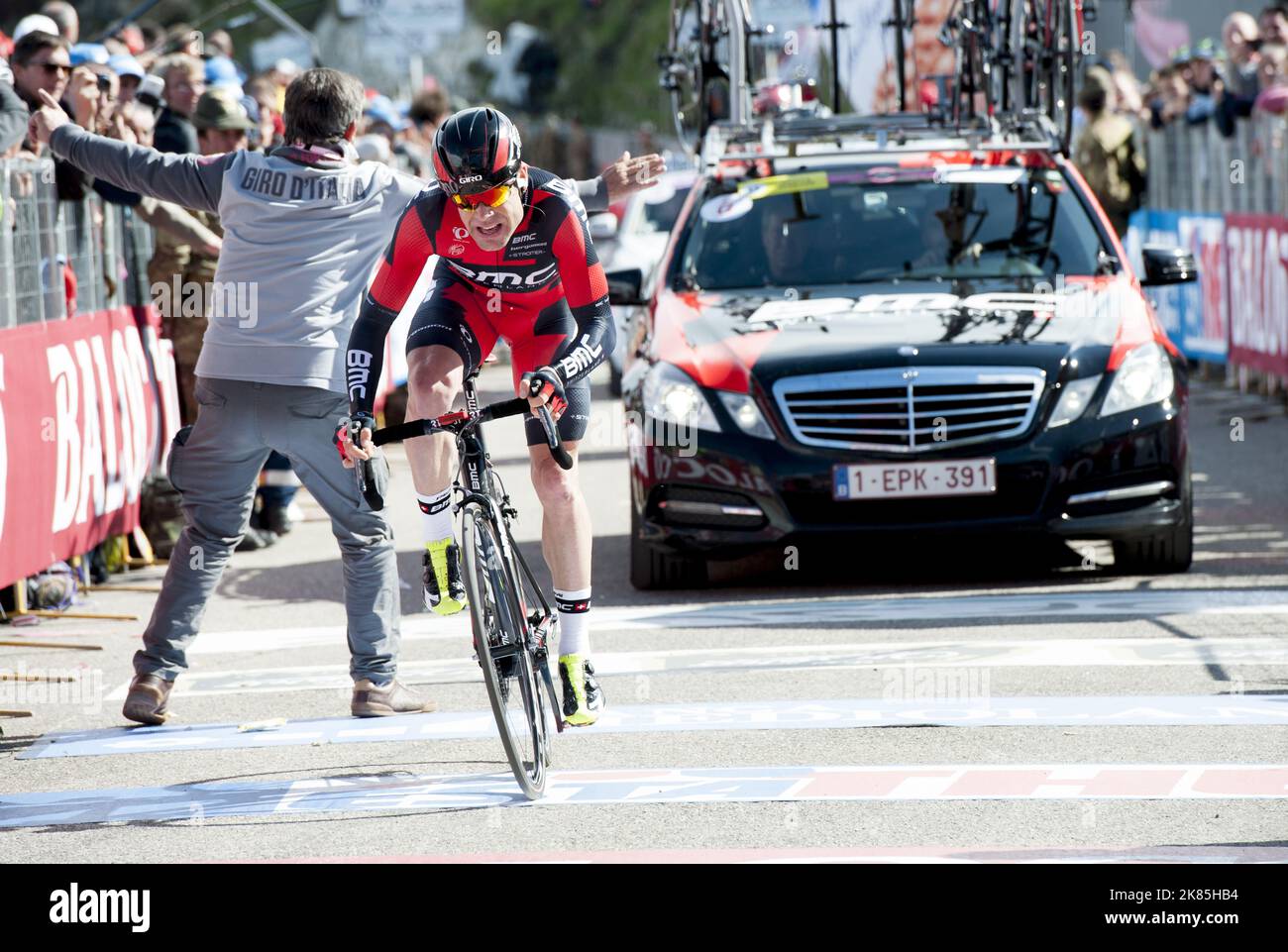 Cadel Evans team BMC crosses the finish line on Stage 19 during the ...