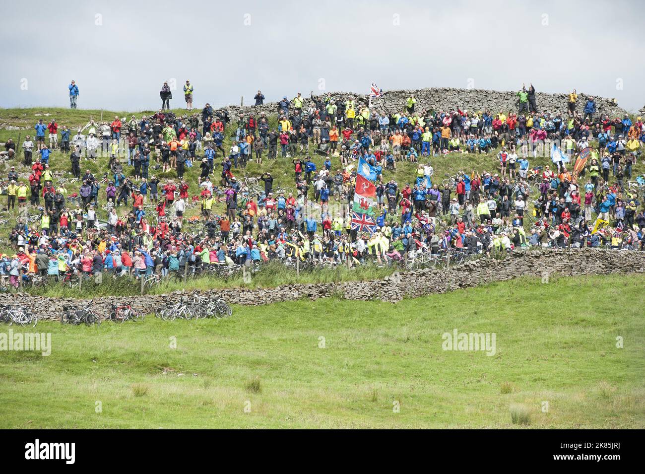 Fans line the road during stage one of the 2014 Tour de France Stock ...