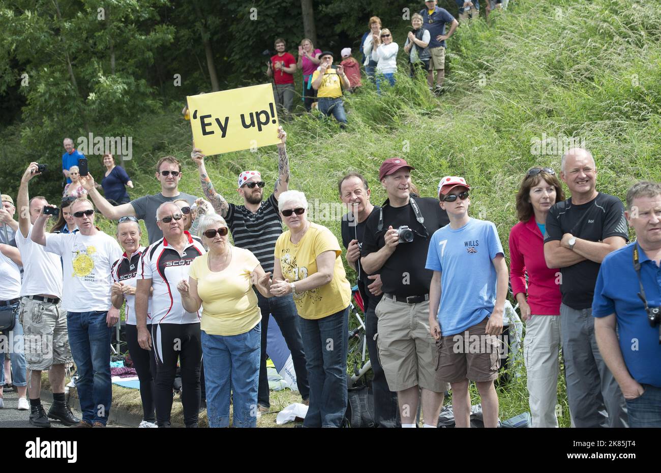Fans line the road during stage one of the 2014 Tour de France Stock ...