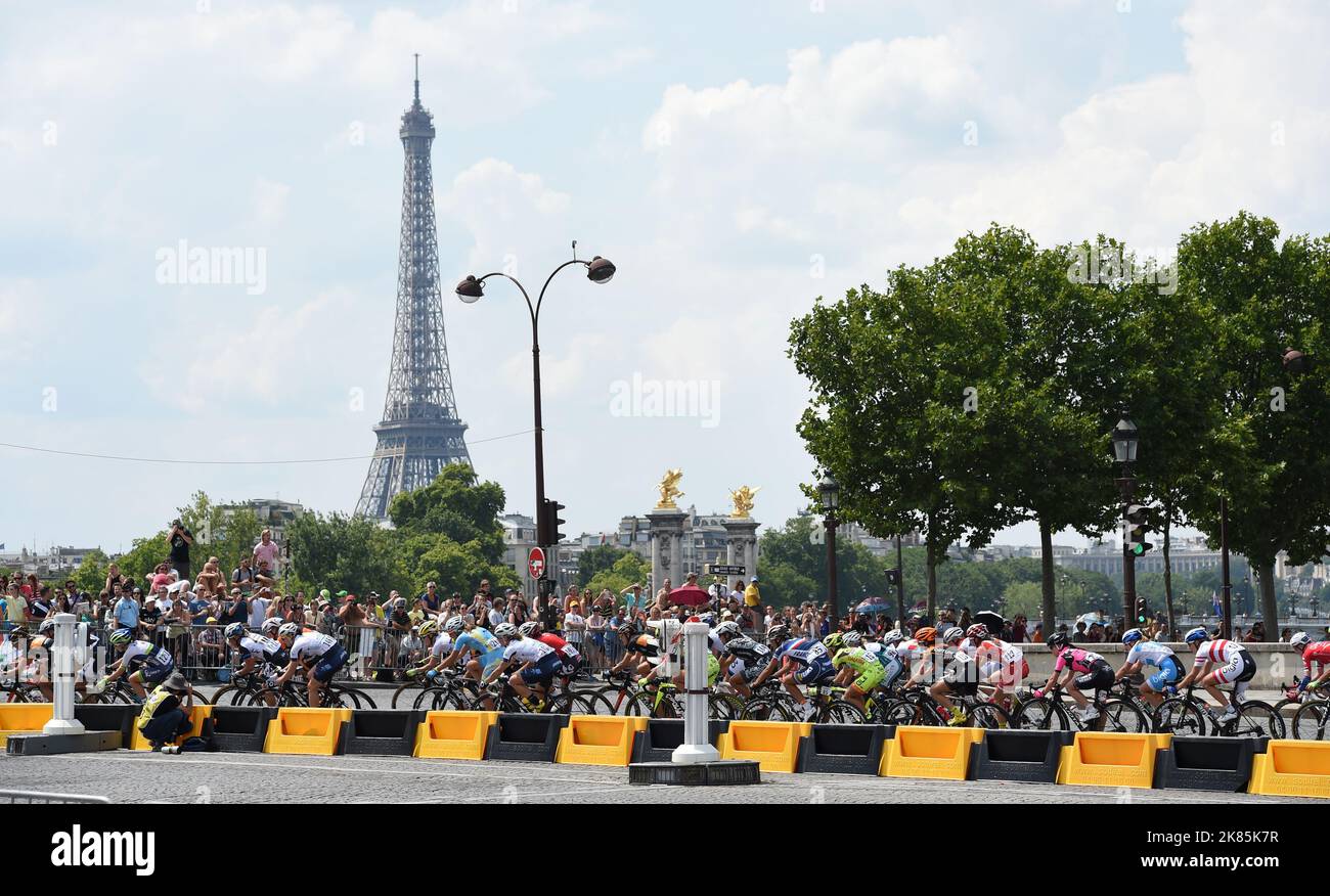 The Eiffel Tower can be seen in the background during the La Course ...