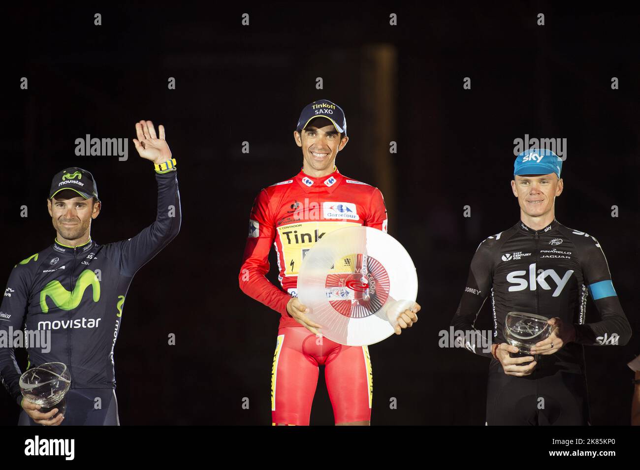 Alberto Contador wins the 2014 Vuelta Espana and holds his trophy ...
