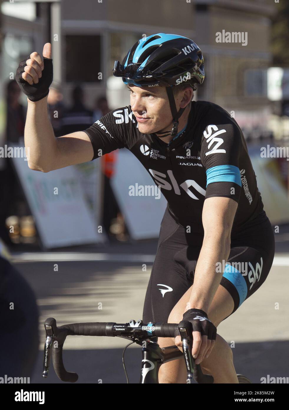 Ben Swift team Sky gives his team mates the thumbs up as he crosses the ...