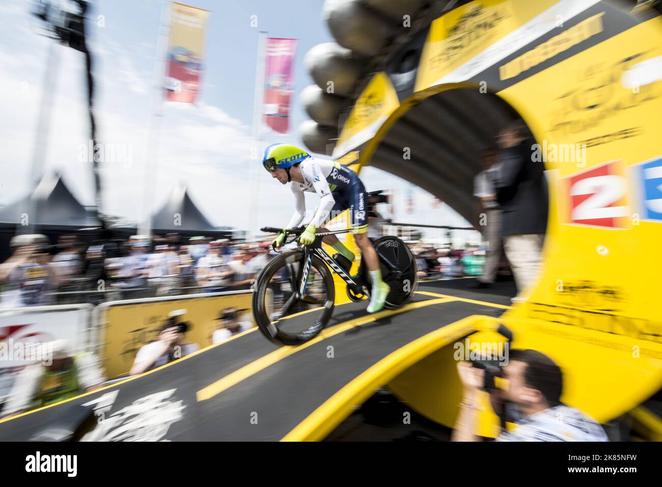 Simon Yates team Orica GreenEdge exits the starting ramp during the ...