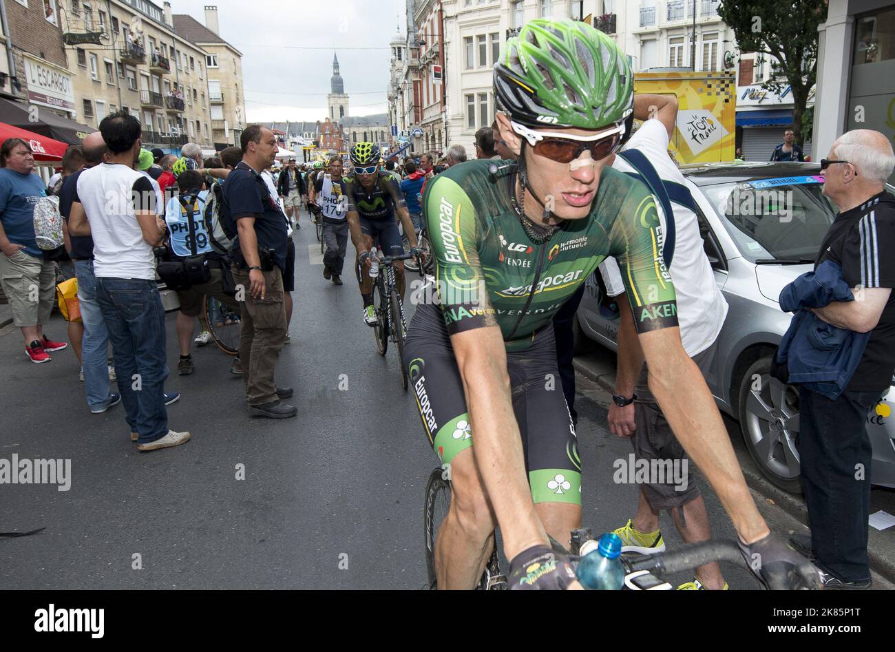 Pierre Rolland team Europcar heads towrds his bus Stock Photo - Alamy