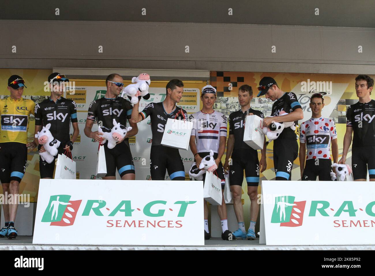 Team Sky stand on the podium to collect the team prize Stock Photo - Alamy
